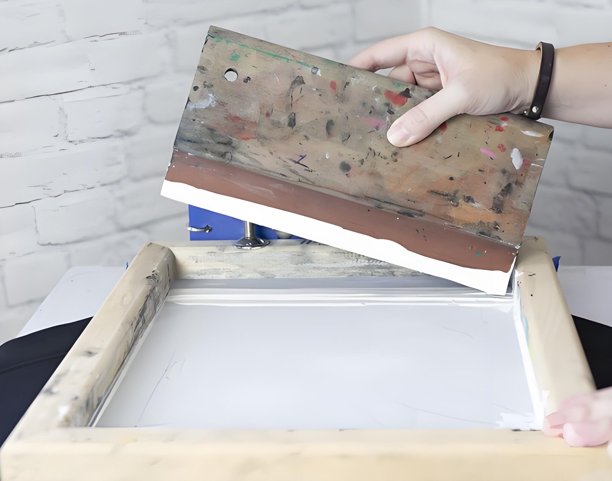 How to print low bleed white plastisol ink